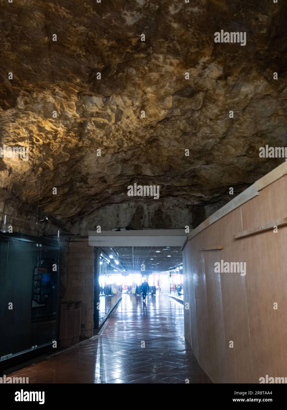 Tunnel through a cliff leading from the port of Monaco to the top of ...