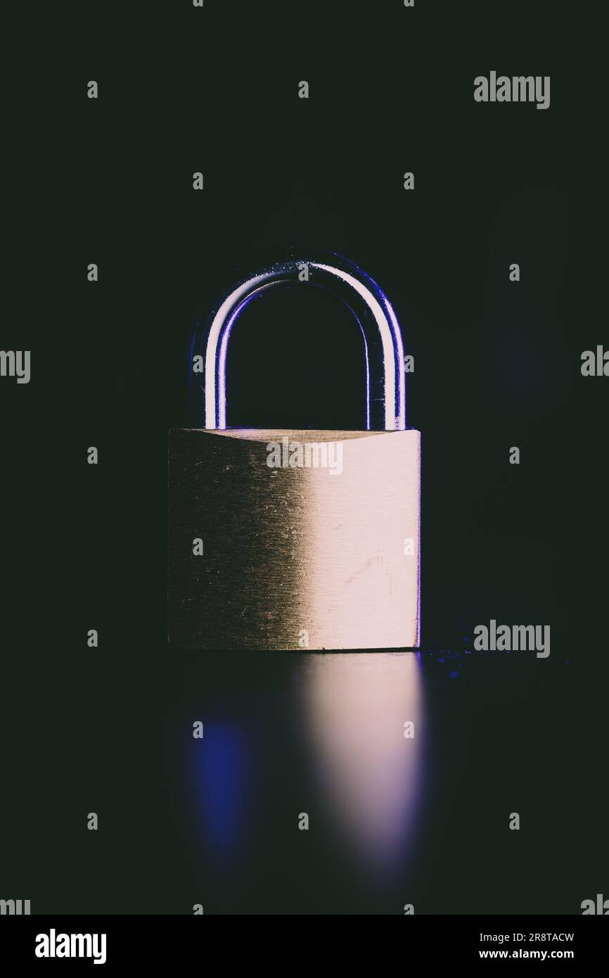 A close-up shot of an old-fashioned metal lock with a soft, out-of ...