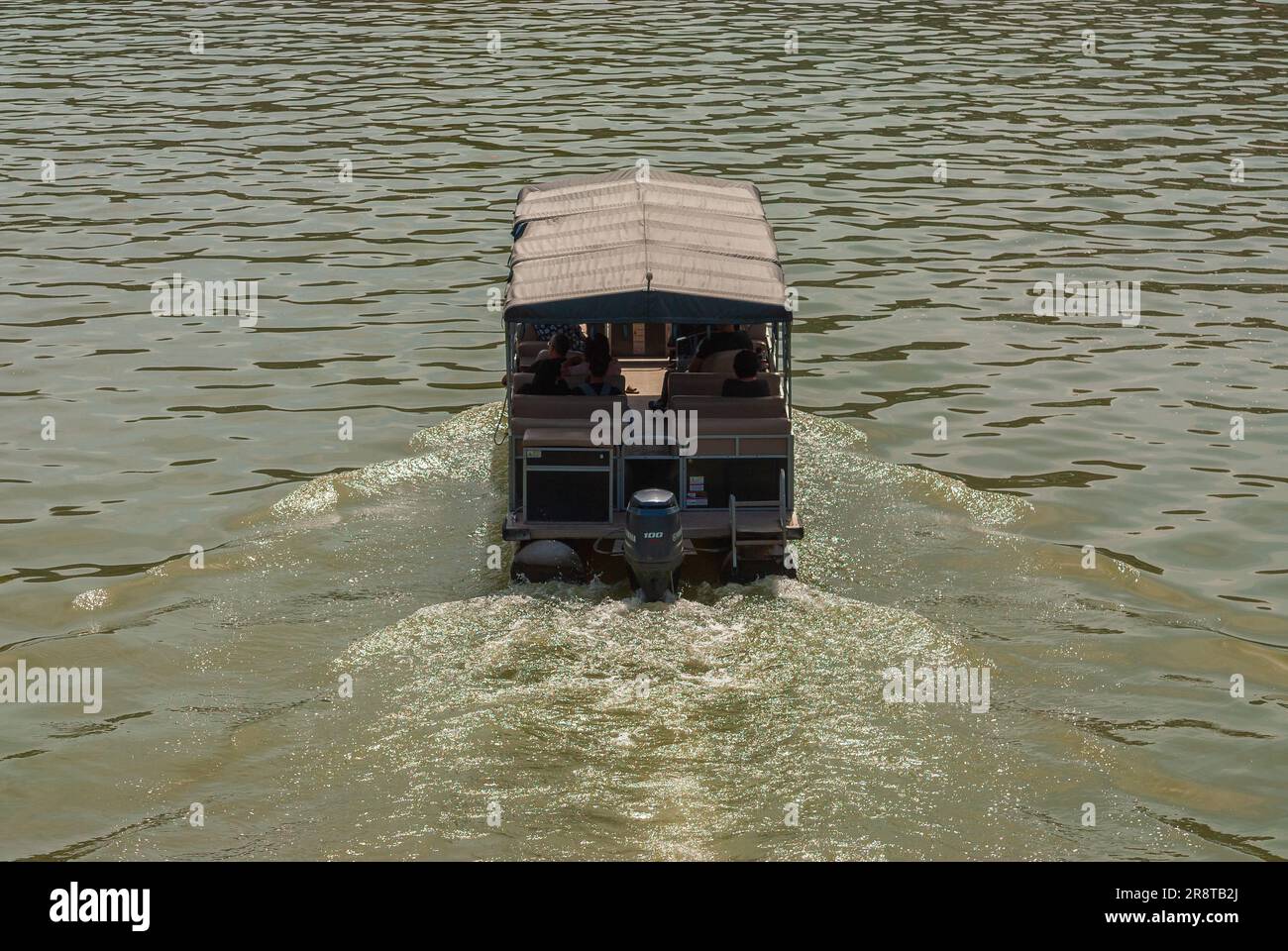 Georgia, Tbilisi - September 17, 2022: Tourists ride on a pleasure boat ...