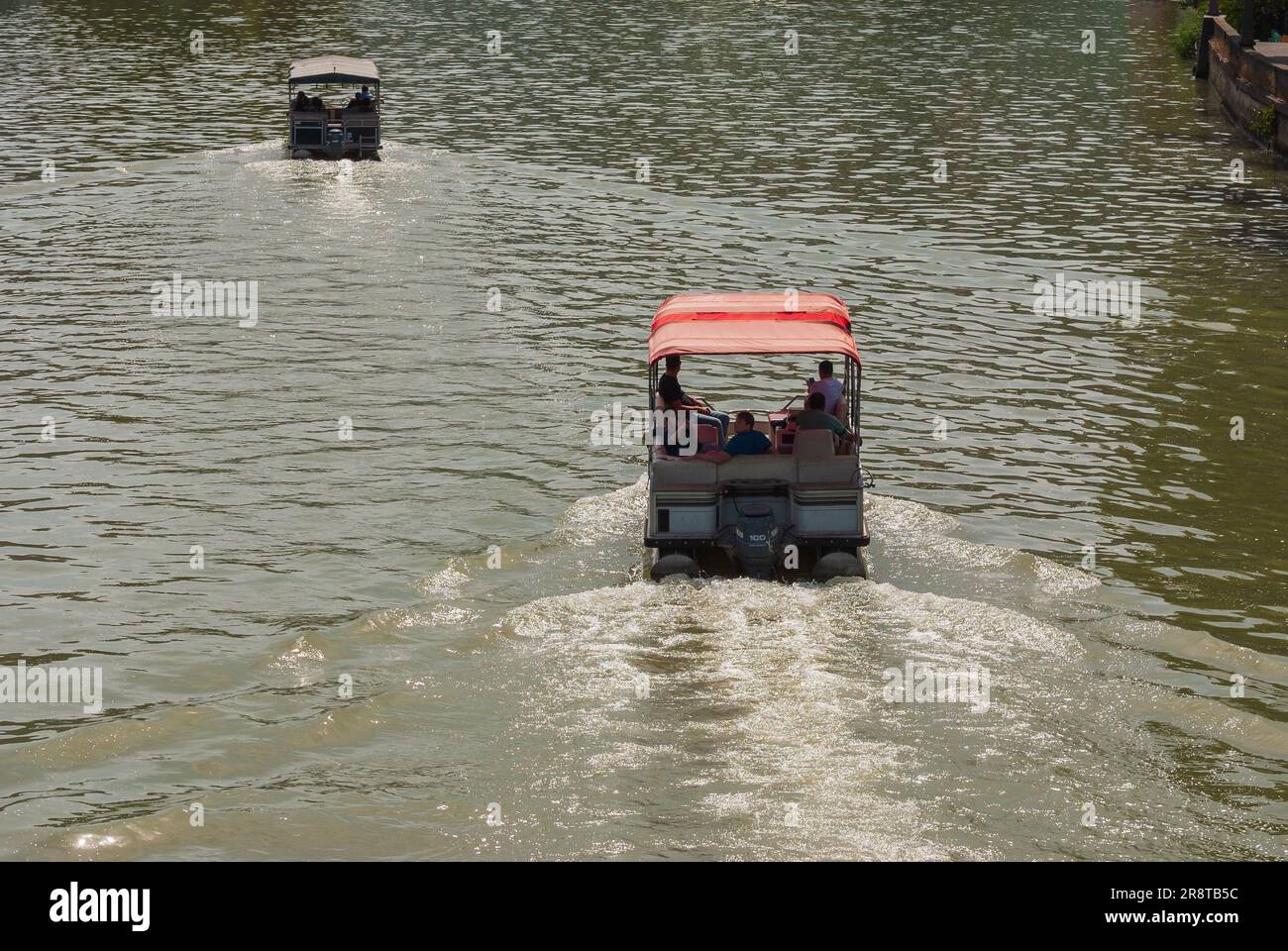 Georgia, Tbilisi - September 17, 2022: Tourists ride on a pleasure boat ...