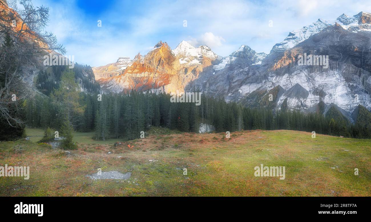 Spectacular autumn view of Oeschinen valley and Bluemlisalp summit ...