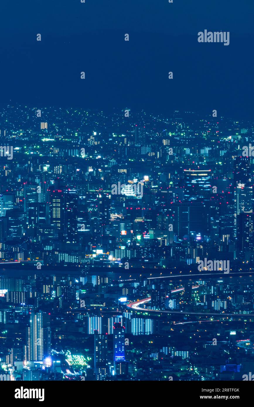 Osaka Castle and Osaka city nightscape viewed from Mount Rokkosan Stock ...