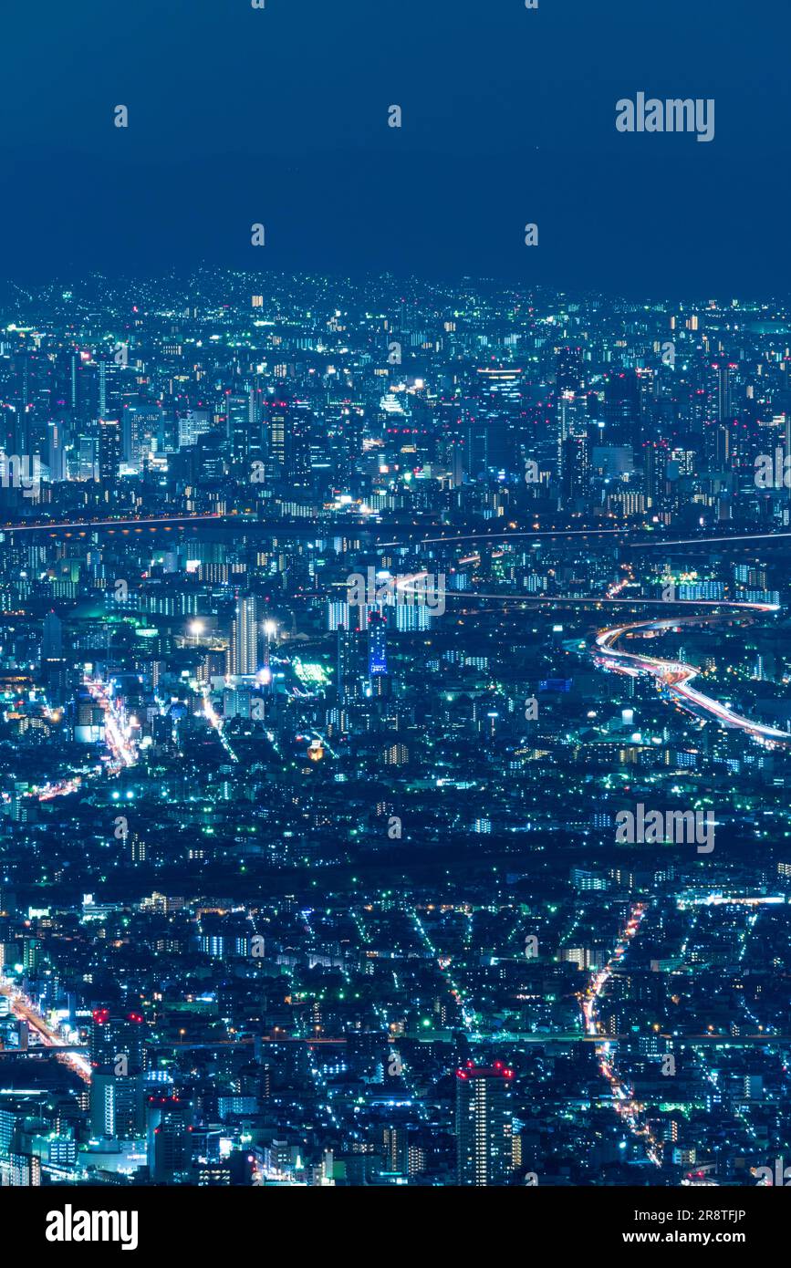 Osaka Castle and Osaka city nightscape viewed from Mount Rokkosan Stock ...