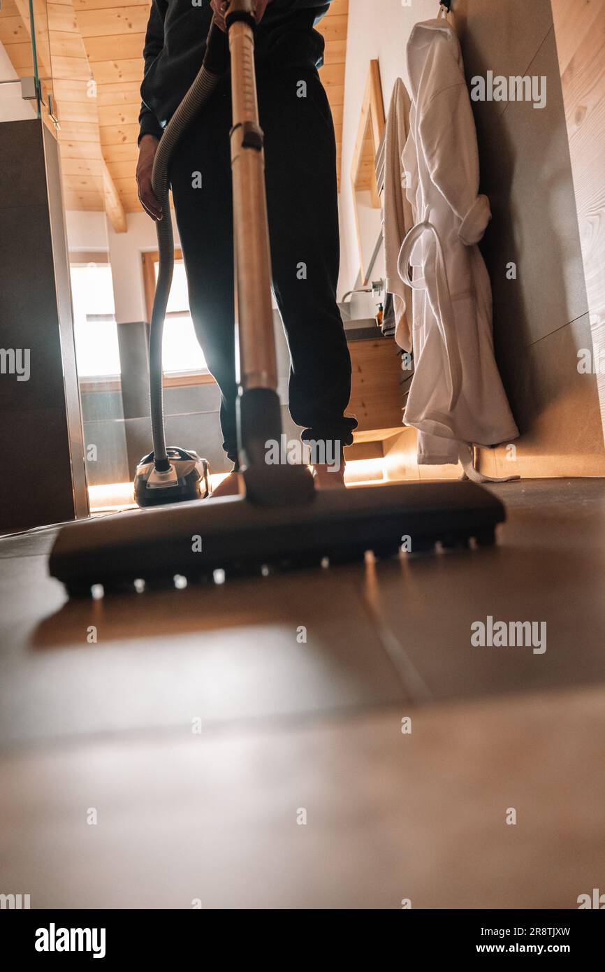 Cleaning equipment. Vacuum cleaner in the bathroom.Cleanliness and ...