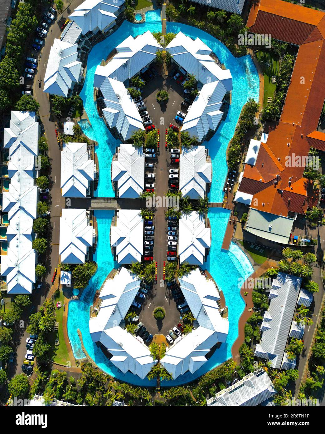 An aerial view of a stunning beach resort, featuring a luxurious ...
