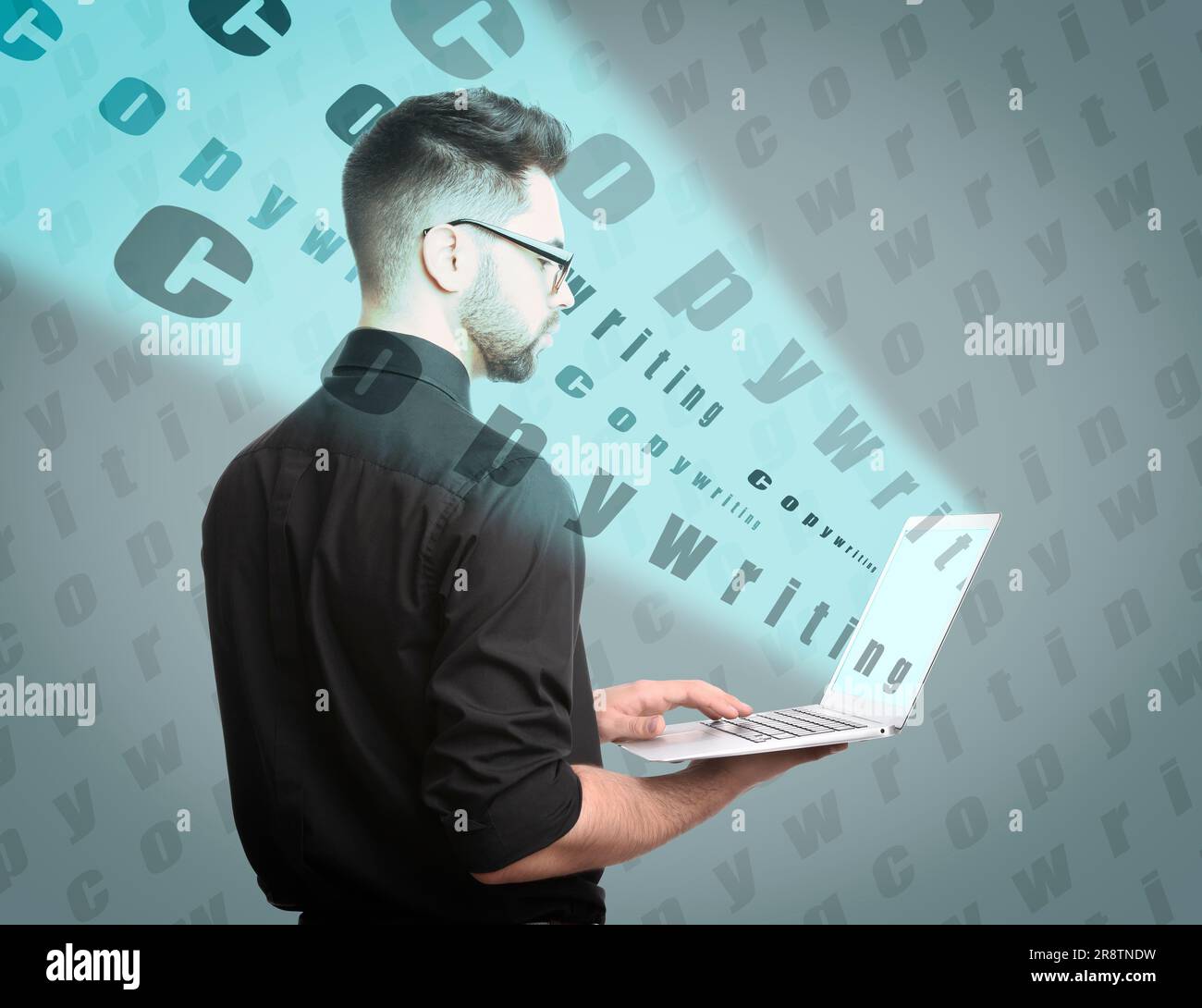 Words Copywriting going out of laptop. Man using device on background ...