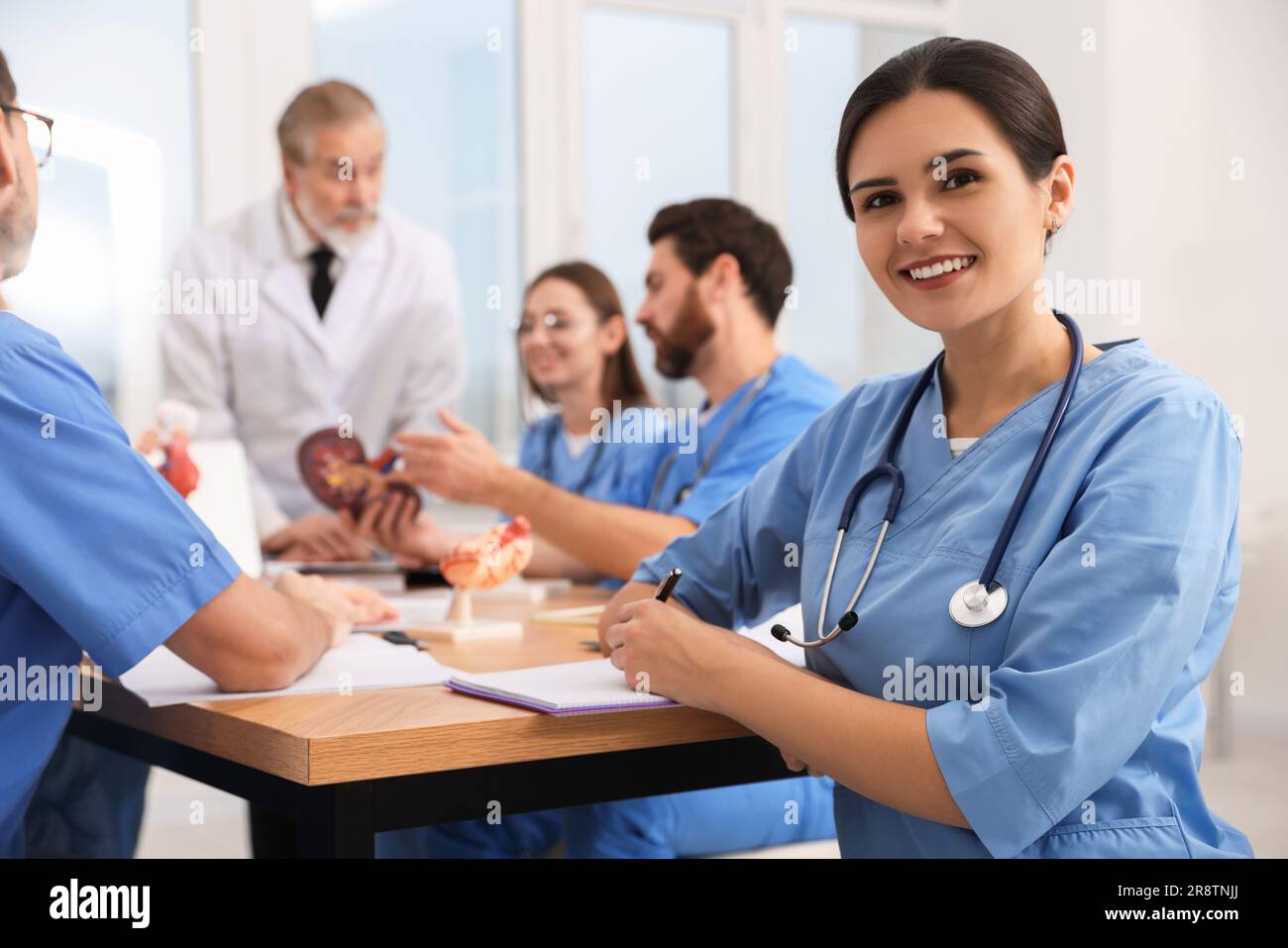 Group work class uniform hi-res stock photography and images - Alamy