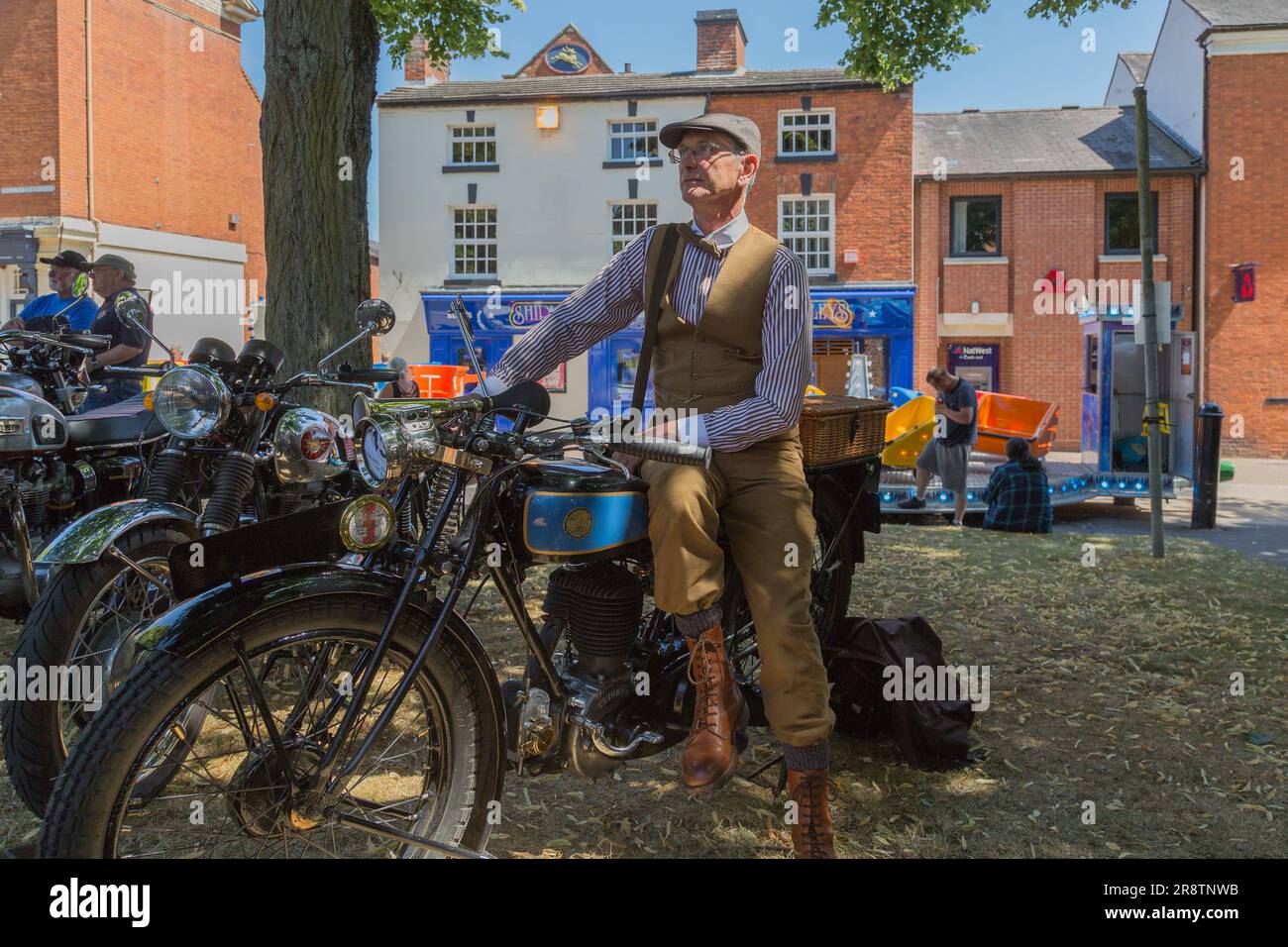 A portrait of the proud owner of a Triumph Model NSD motorcycle ...