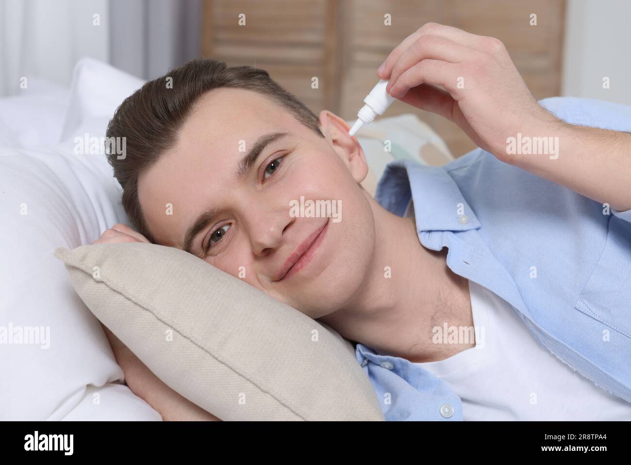 Ear drops adult hi-res stock photography and images - Alamy