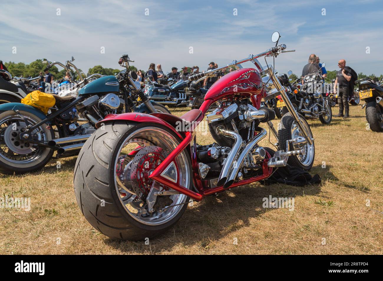 Eye catching red Bobber with gleaming chromed engine and exhausts ...