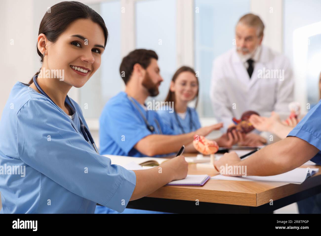 Portrait of young intern wearing uniform on lecture in university Stock ...