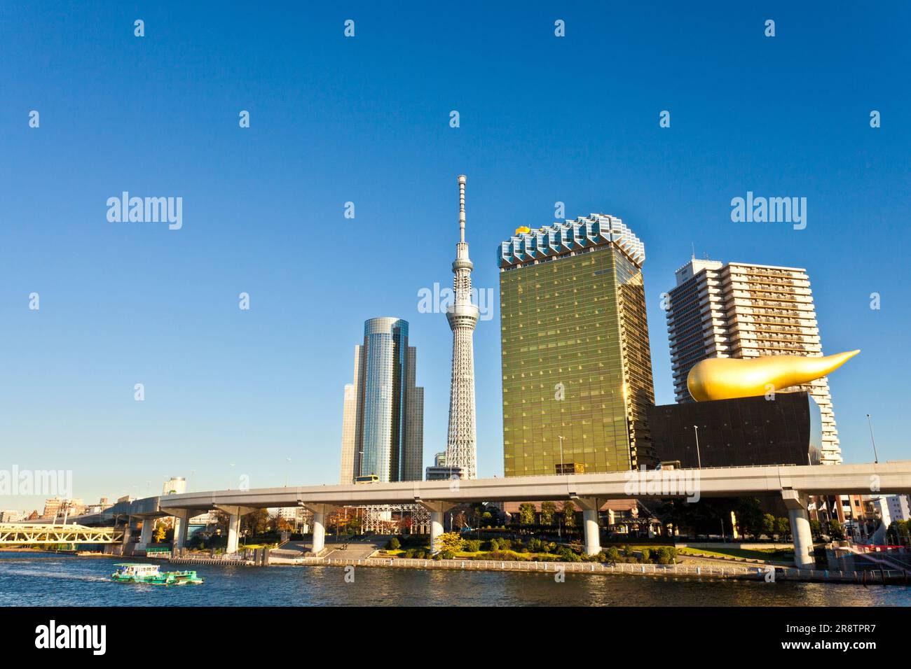 The Tokyo Skytree Tower, the Asahi Beer tower, and Sumidaku ward ...