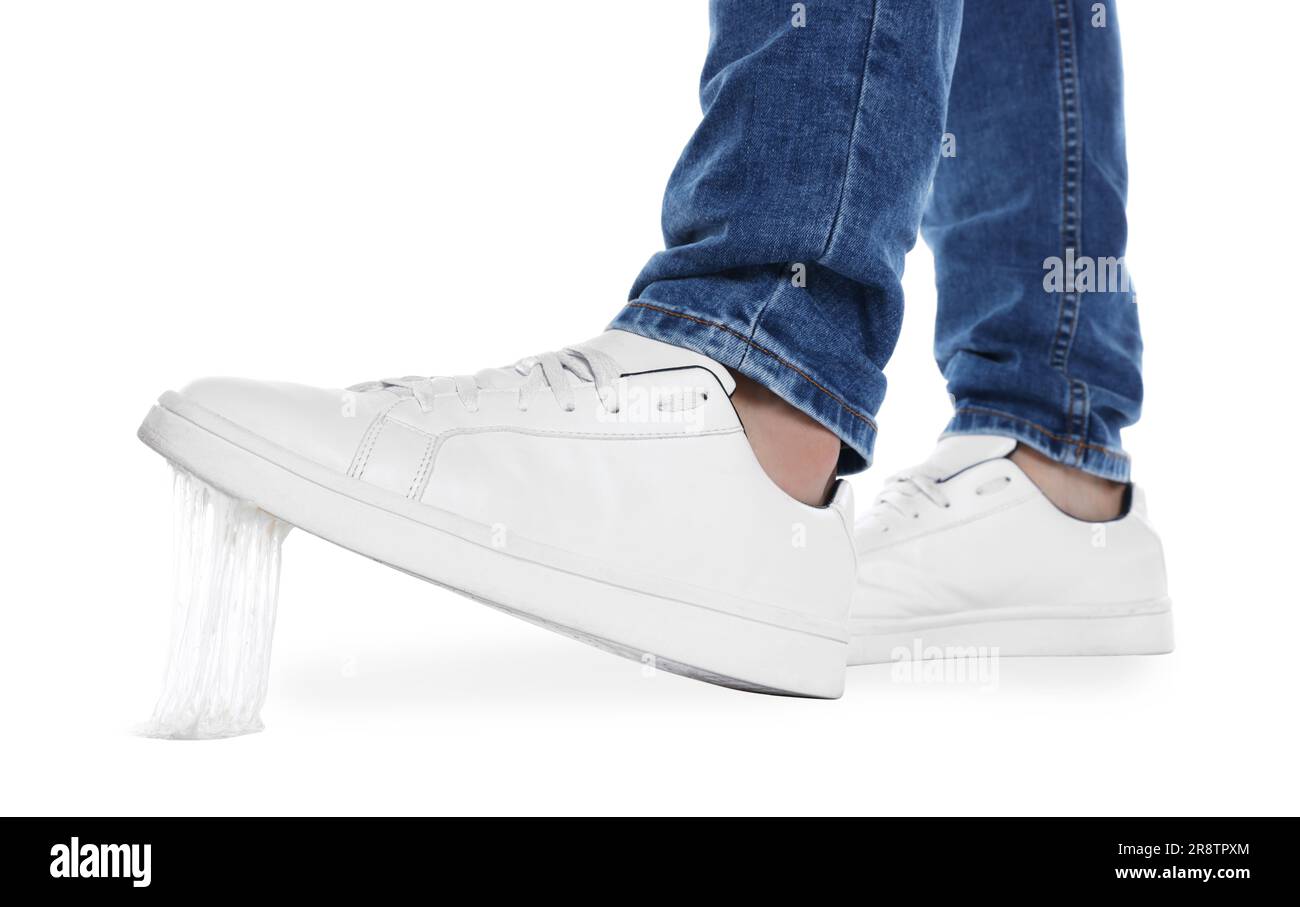 Person stepping into chewing gum on white background, closeup Stock ...