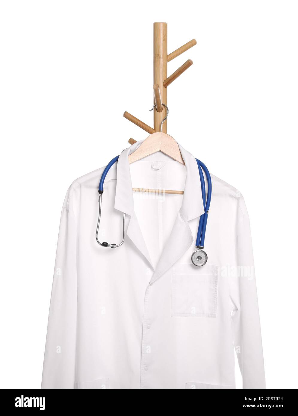 Doctor's gown and stethoscope on rack against white background. Medical ...