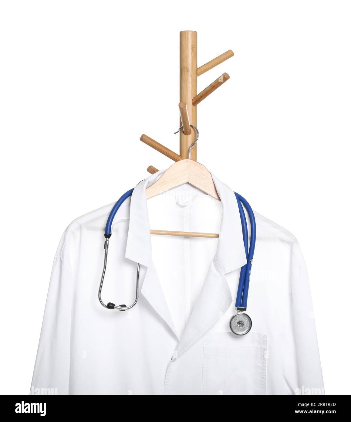 Doctor's gown and stethoscope on rack against white background. Medical ...