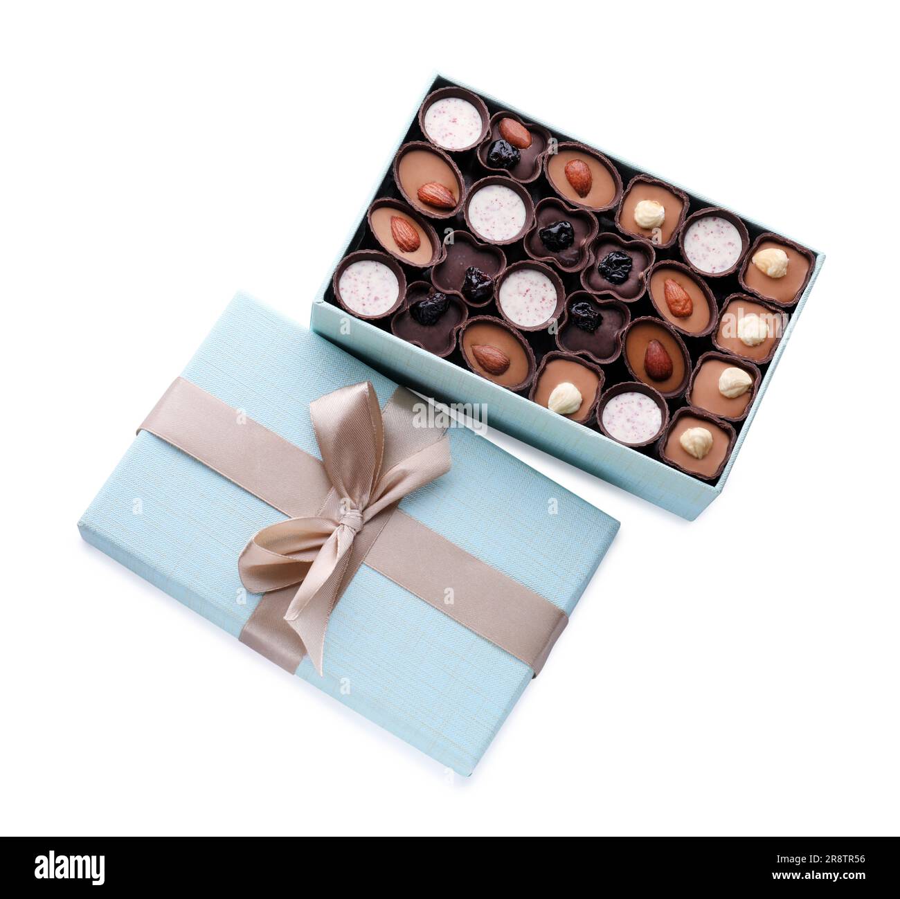 Box of delicious chocolate candies isolated on white, top view Stock ...