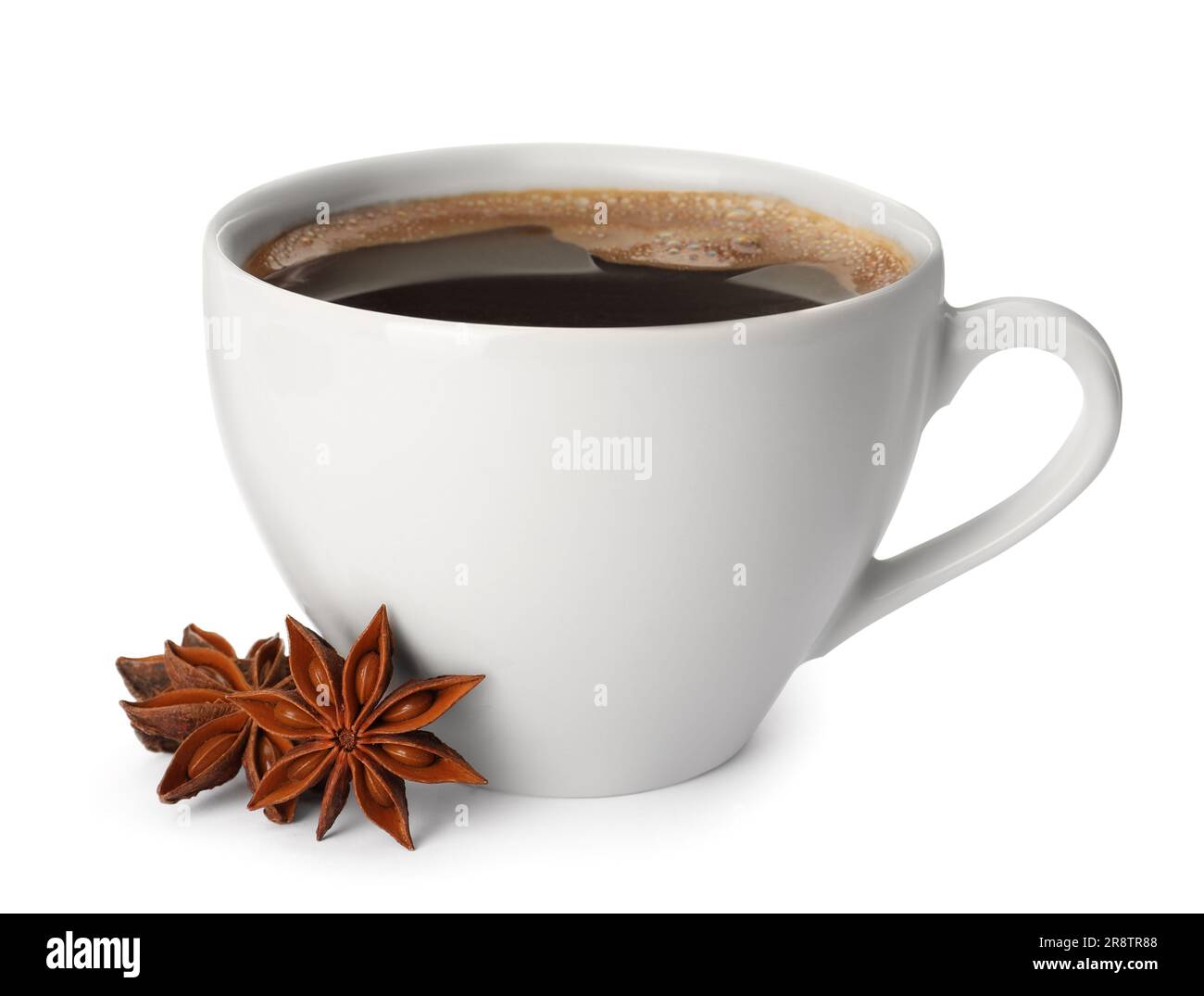 Cup of aromatic coffee with anise stars on white background Stock Photo ...