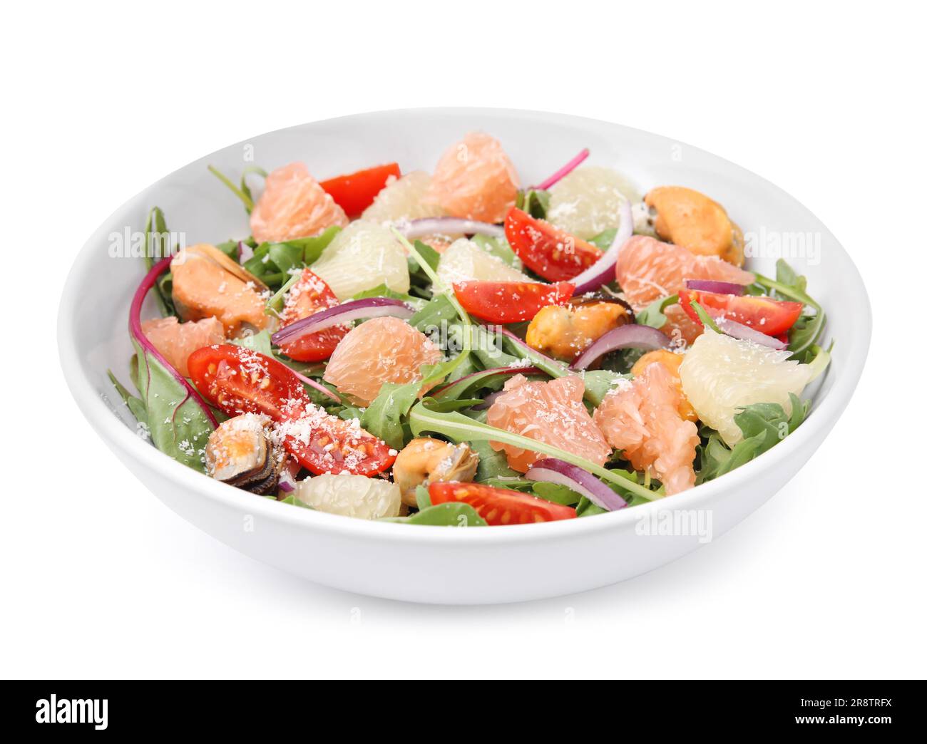 Delicious pomelo salad with tomatoes and mussels in bowl isolated on ...
