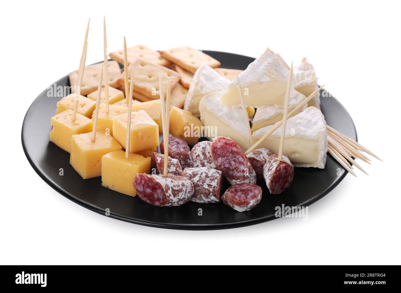 Toothpick appetizers. Tasty cheese, sausage, and crackers on white ...