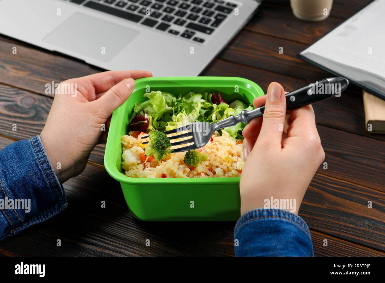 Office employee having business lunch at workplace, closeup Stock Photo ...