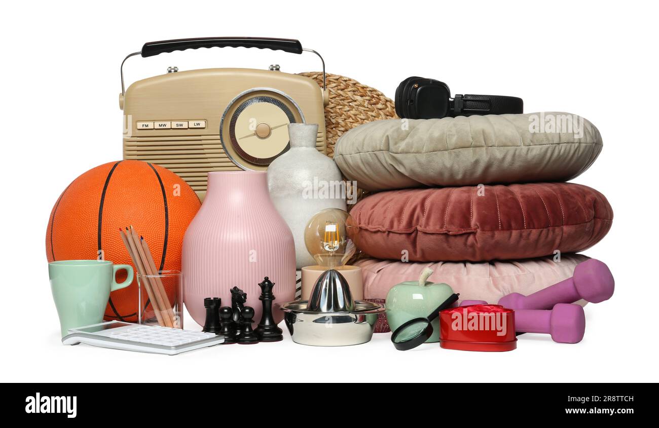 Many different stuff isolated on white. Garage sale Stock Photo - Alamy