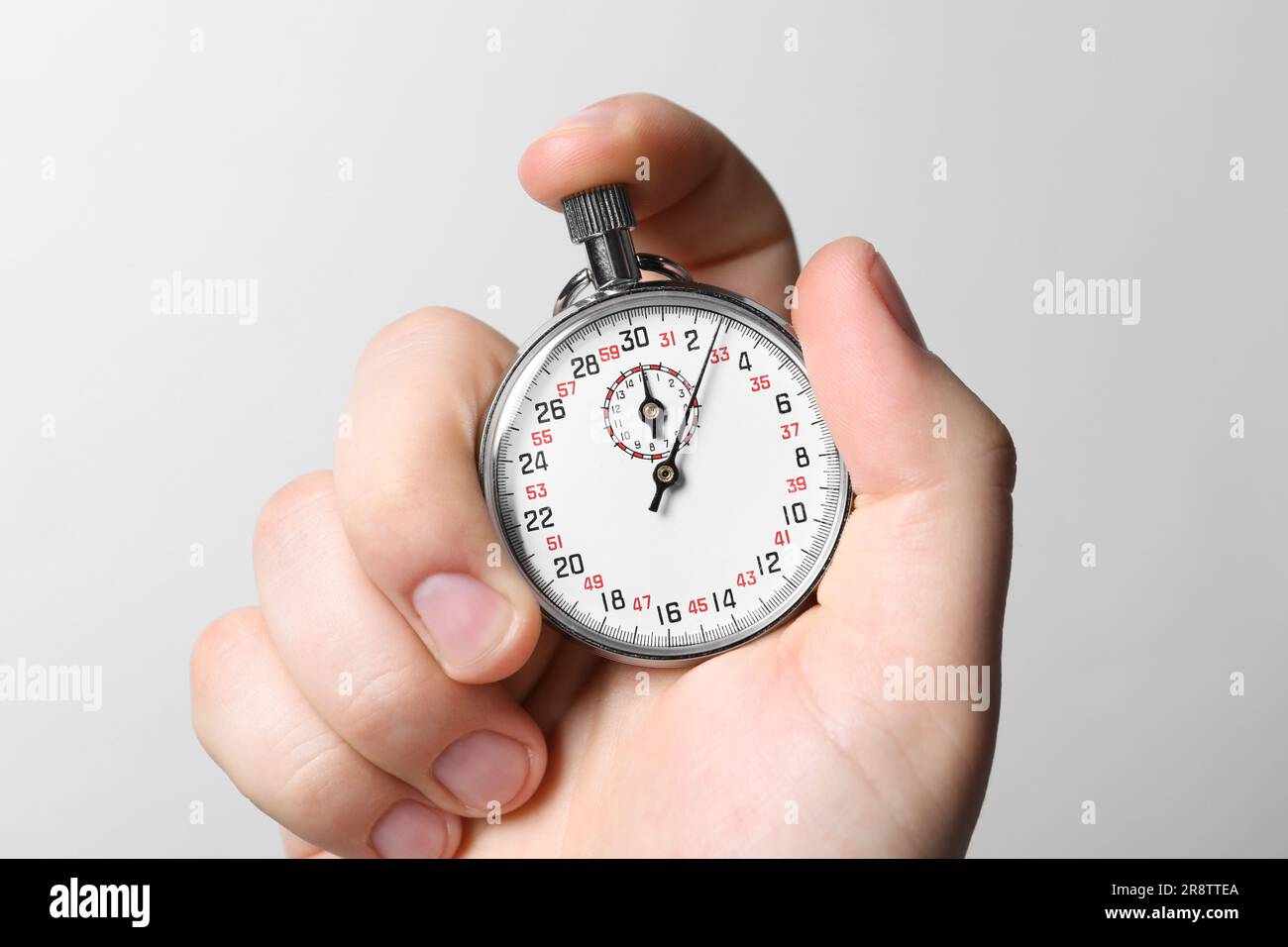 Man holding vintage timer on white background, closeup Stock Photo - Alamy