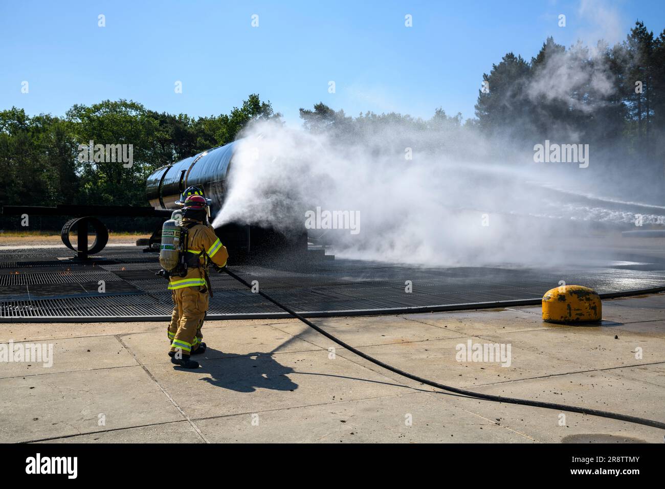 U.S. Air Force Senior Airman Zach Gager and Staff Sgt. Ronald Card ...