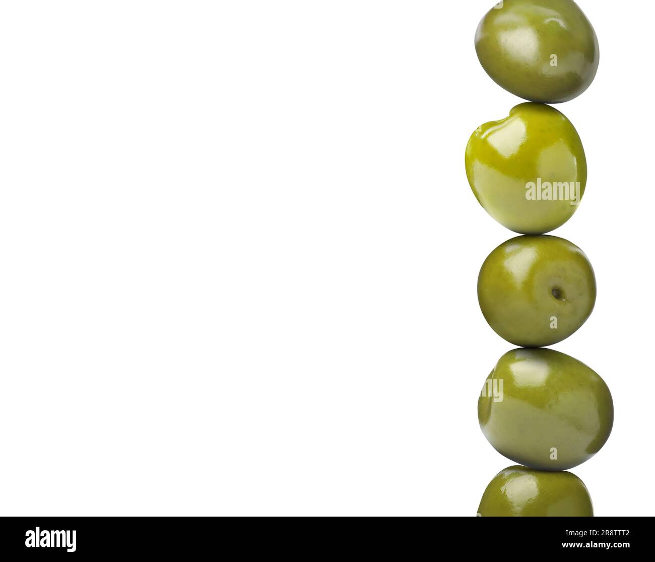 Stack of whole olives on white background Stock Photo - Alamy