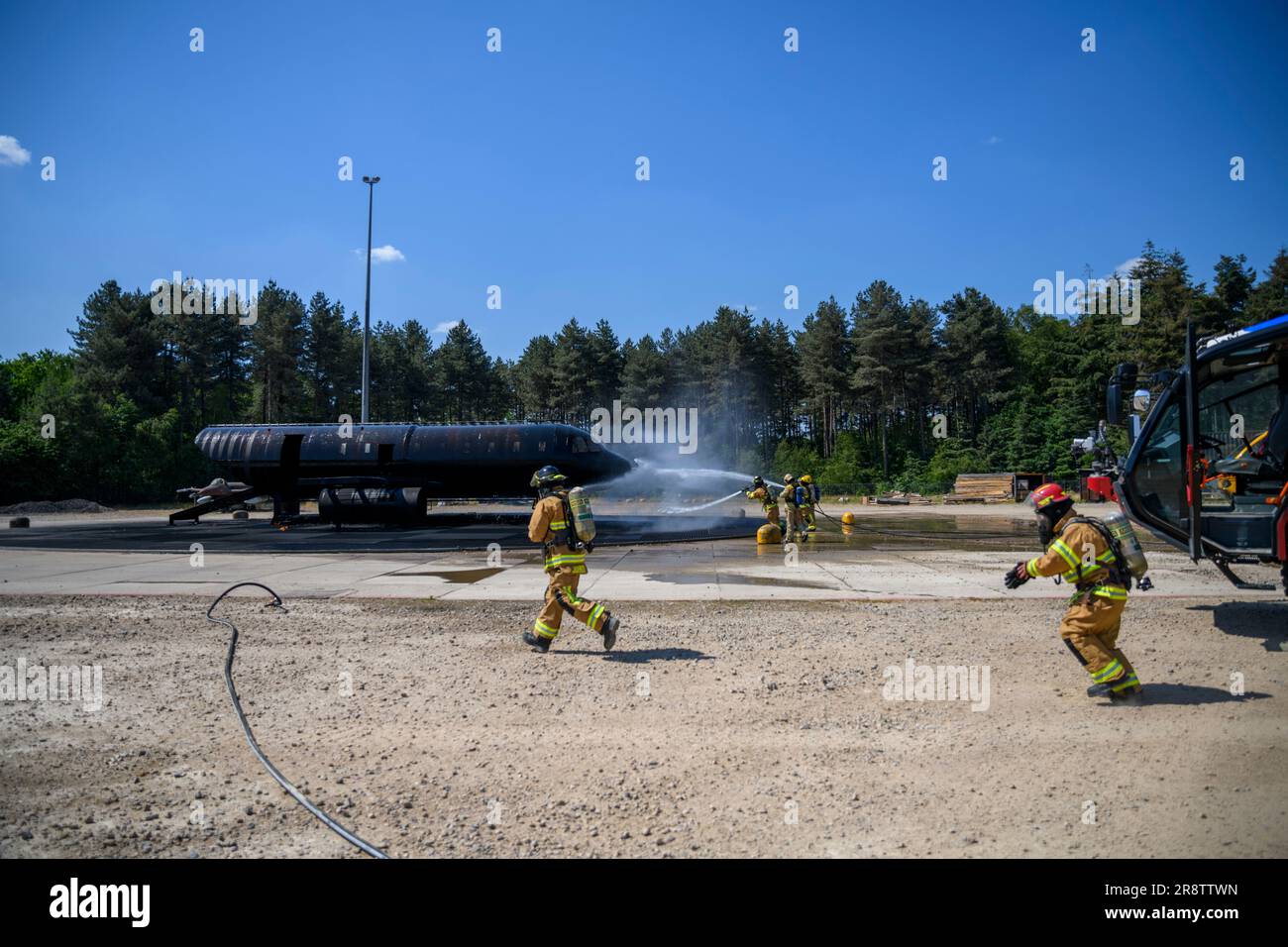 U.S. Air Force Firefighters with the 424th Air Base Squadron run ...