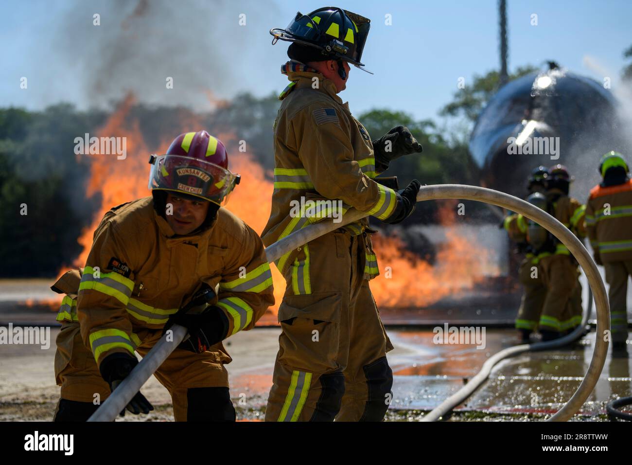 U.S. Air Force Staff Sgt. Andrew Daniel and Senior Airman Zachary Gager ...