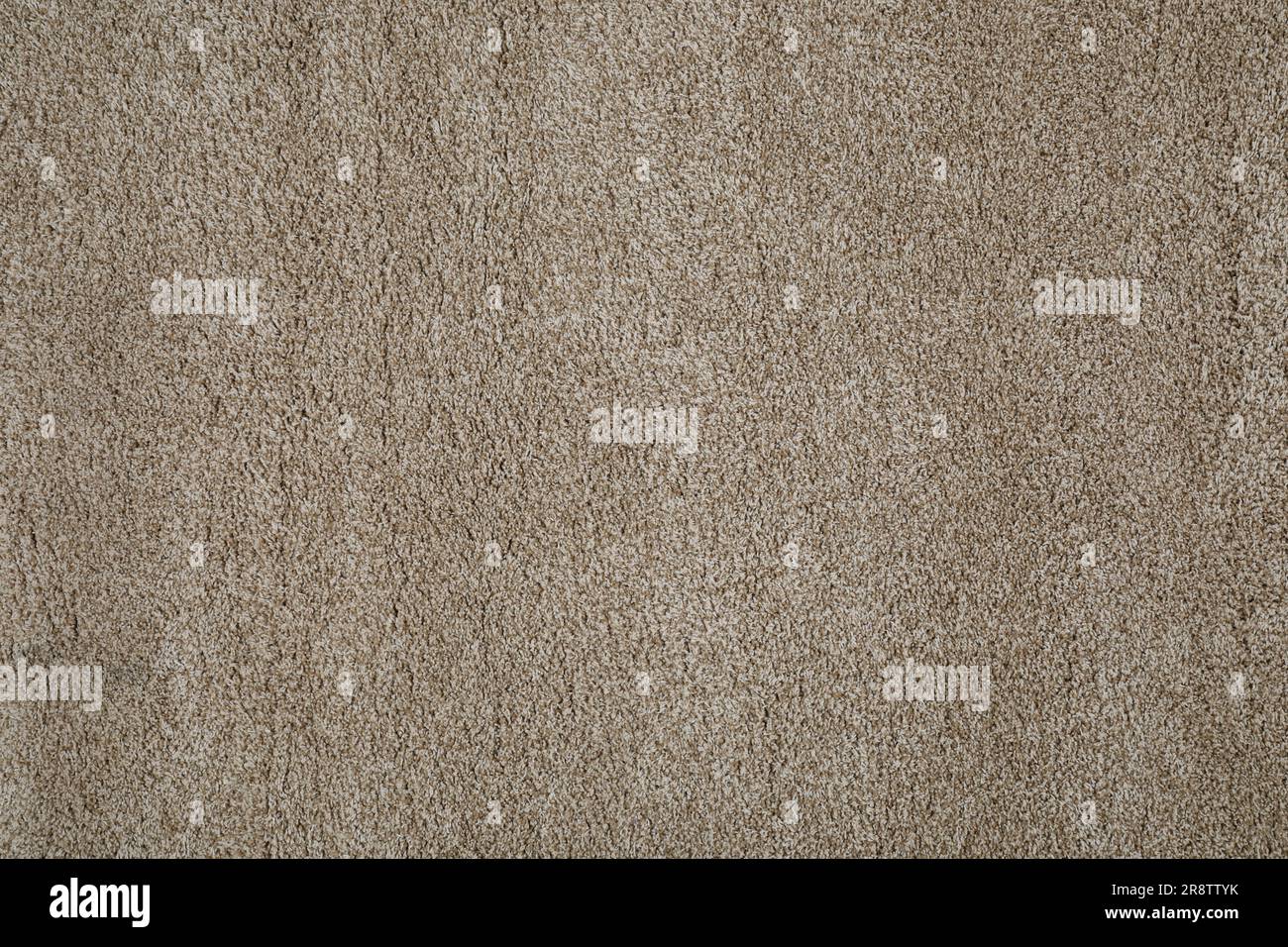 Stylish soft beige carpet as background, top view Stock Photo - Alamy