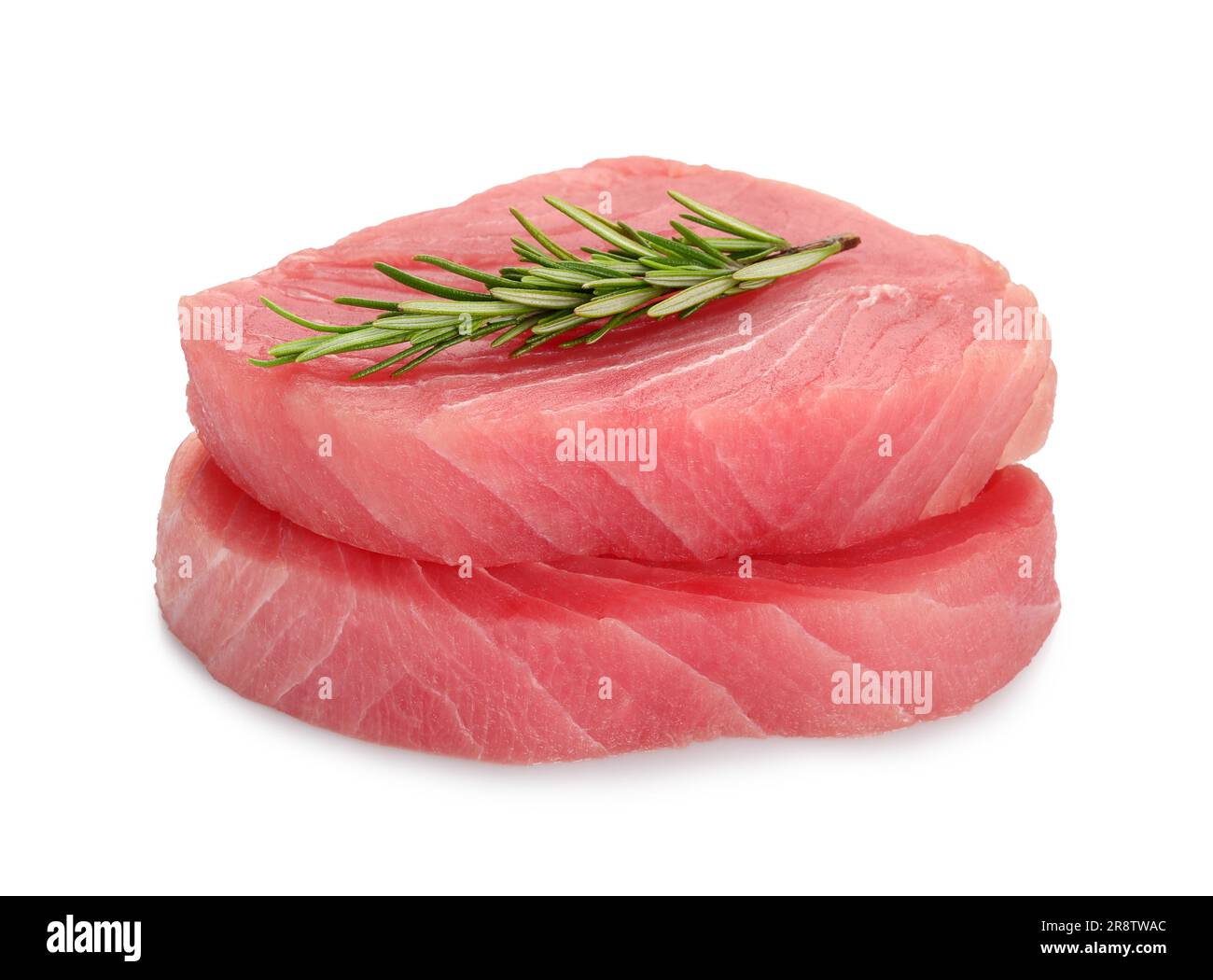 Raw tuna fillets with rosemary on white background Stock Photo - Alamy