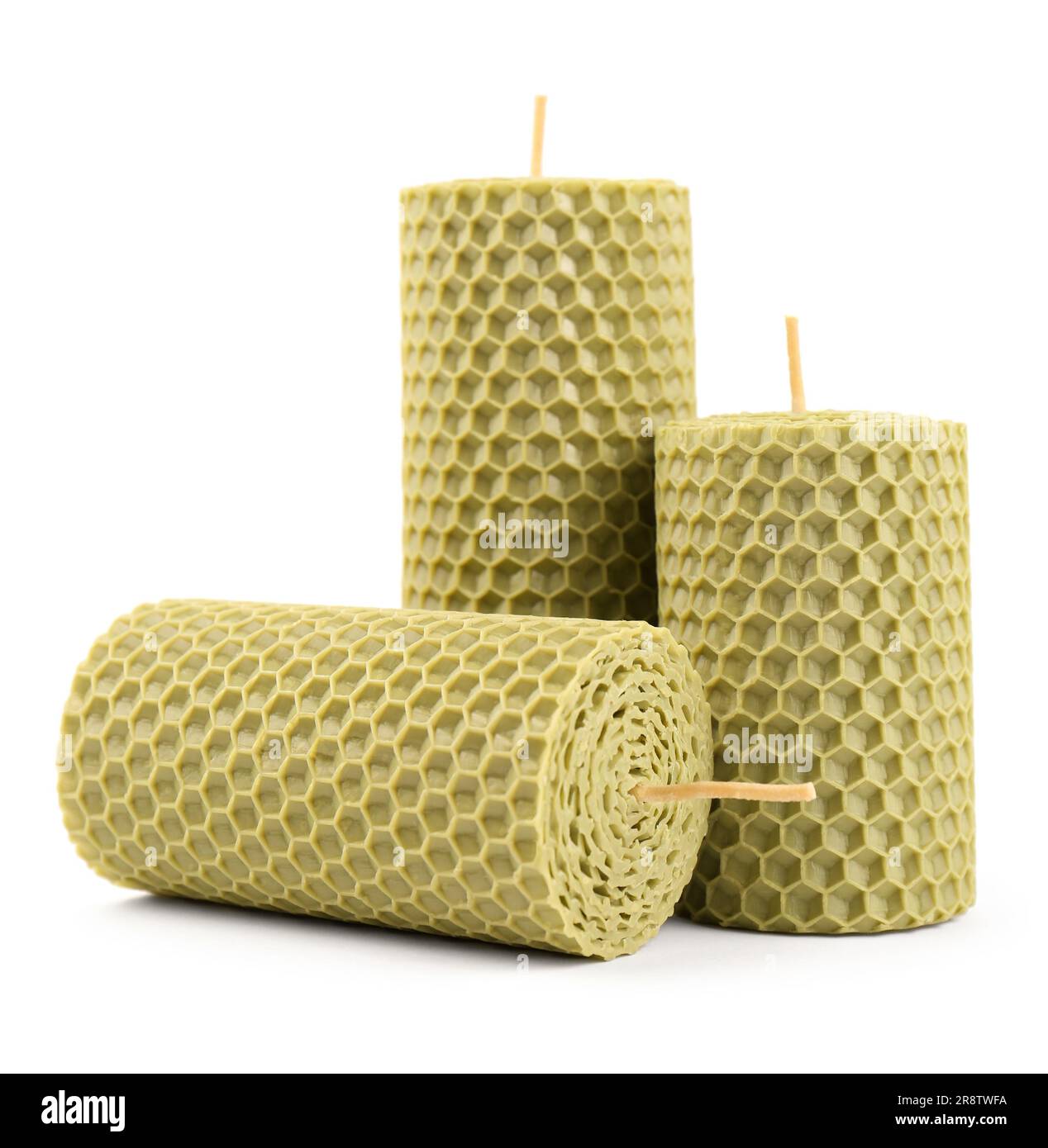 Set of beeswax candles on white background Stock Photo - Alamy