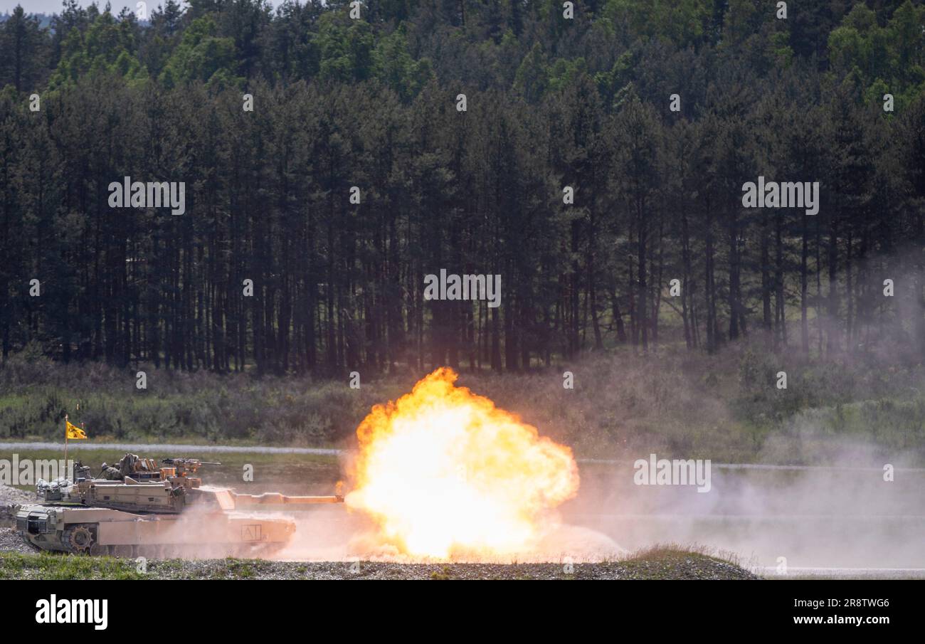 M1 Abrams Tank fires a round at the firing range at Grafenwoehr ...
