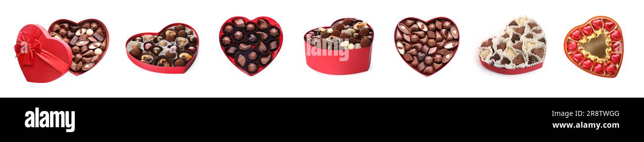 Many heart shaped boxes with tasty chocolate candies on white ...