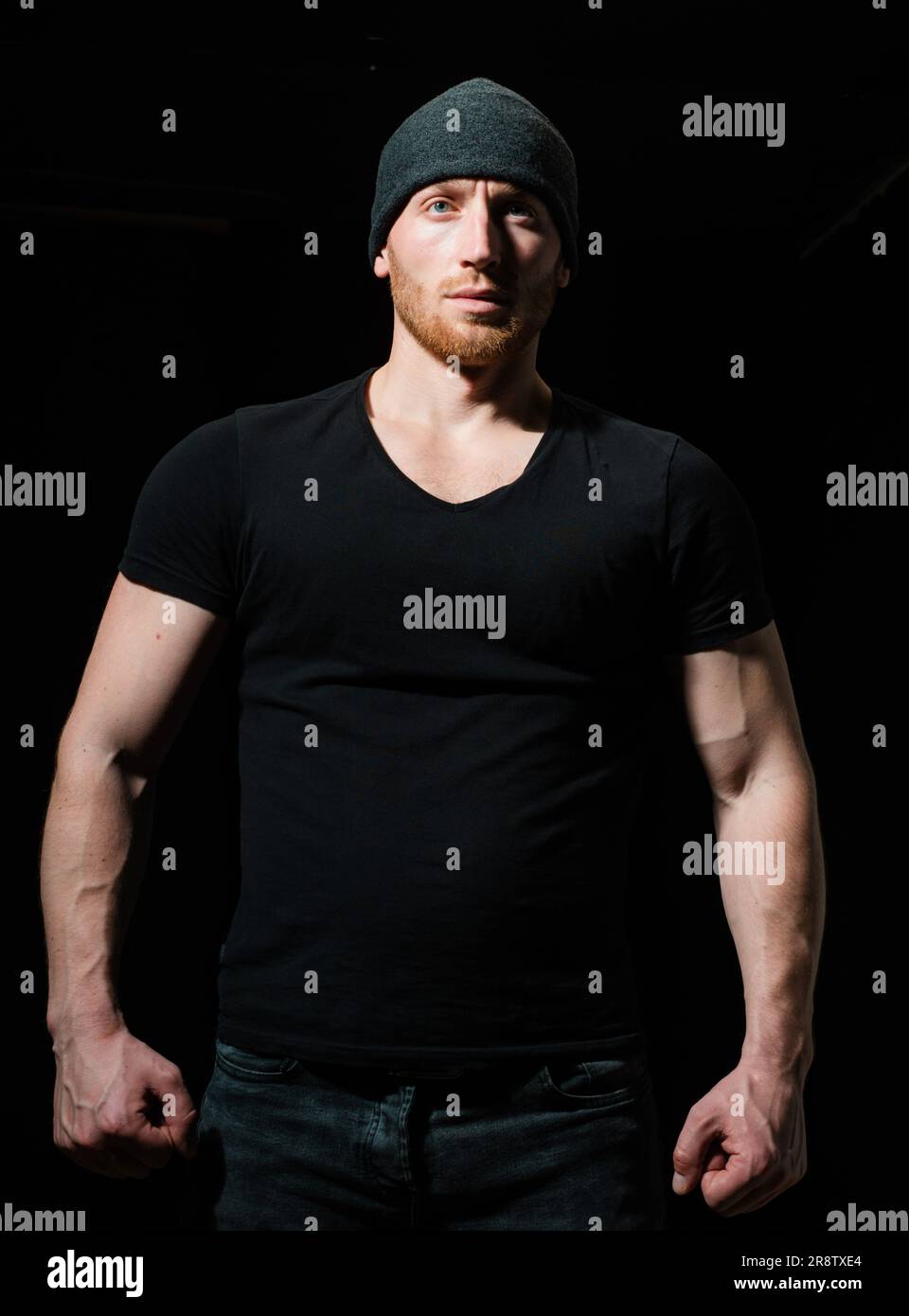 Brutal angry gang man lifestyle, serious handsome guy on black Stock ...