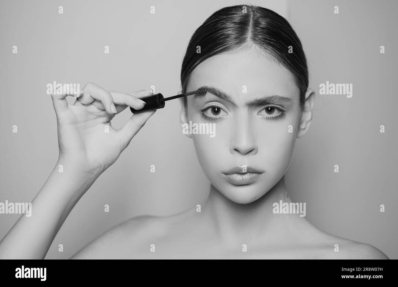 Young Beautiful Woman Does Natural Brow Makeup Portrait Of Girl With Professional Makeup And