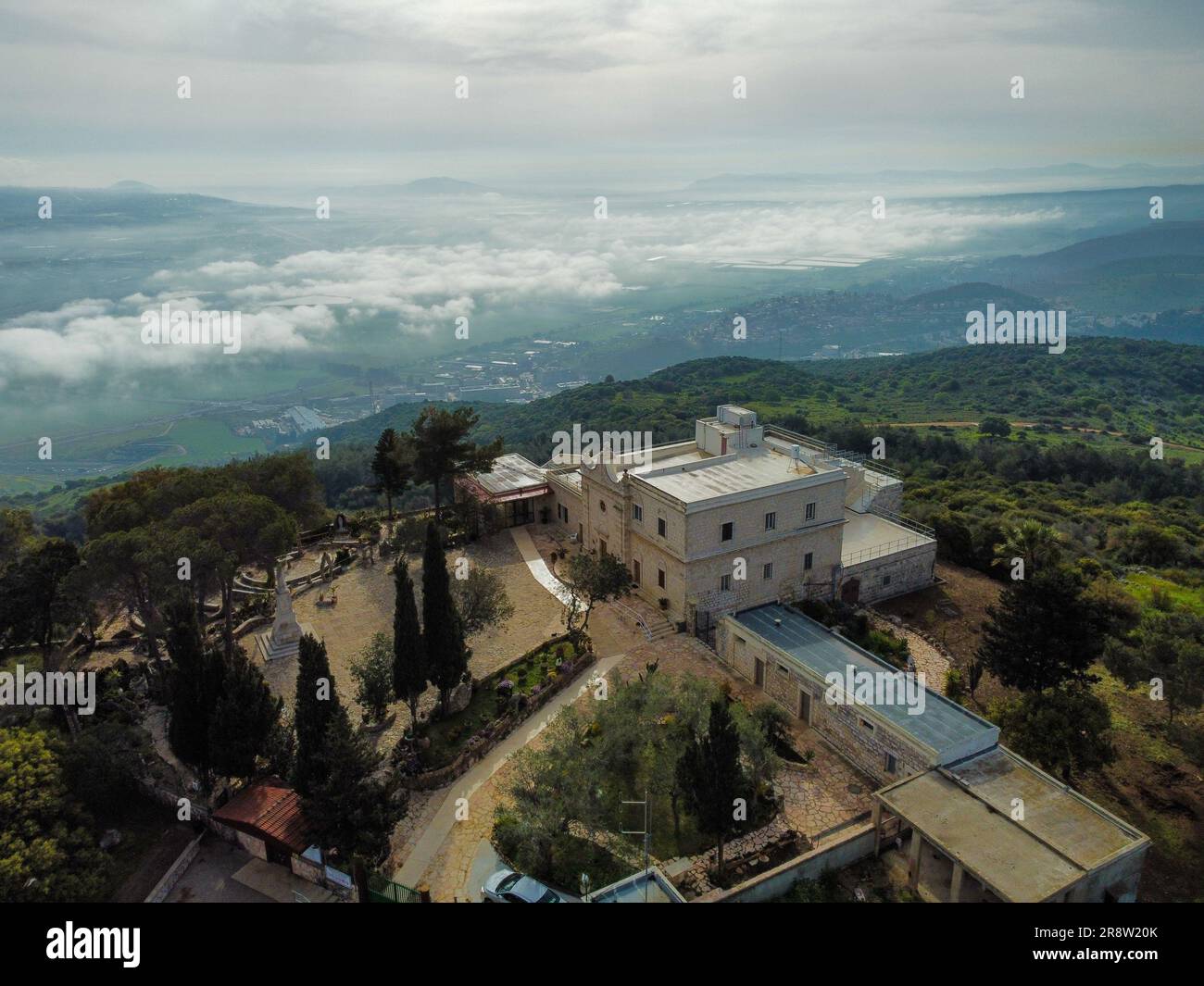 An aerial view of the historic Castello Monaci castle perched atop a ...