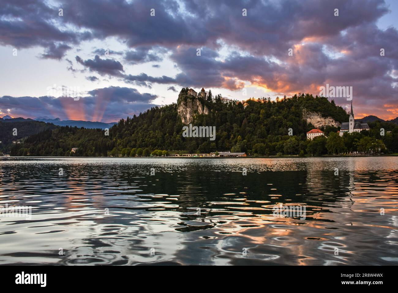 Reflections of the Sunset in Lake Bled, Slovenia Stock Photo - Alamy