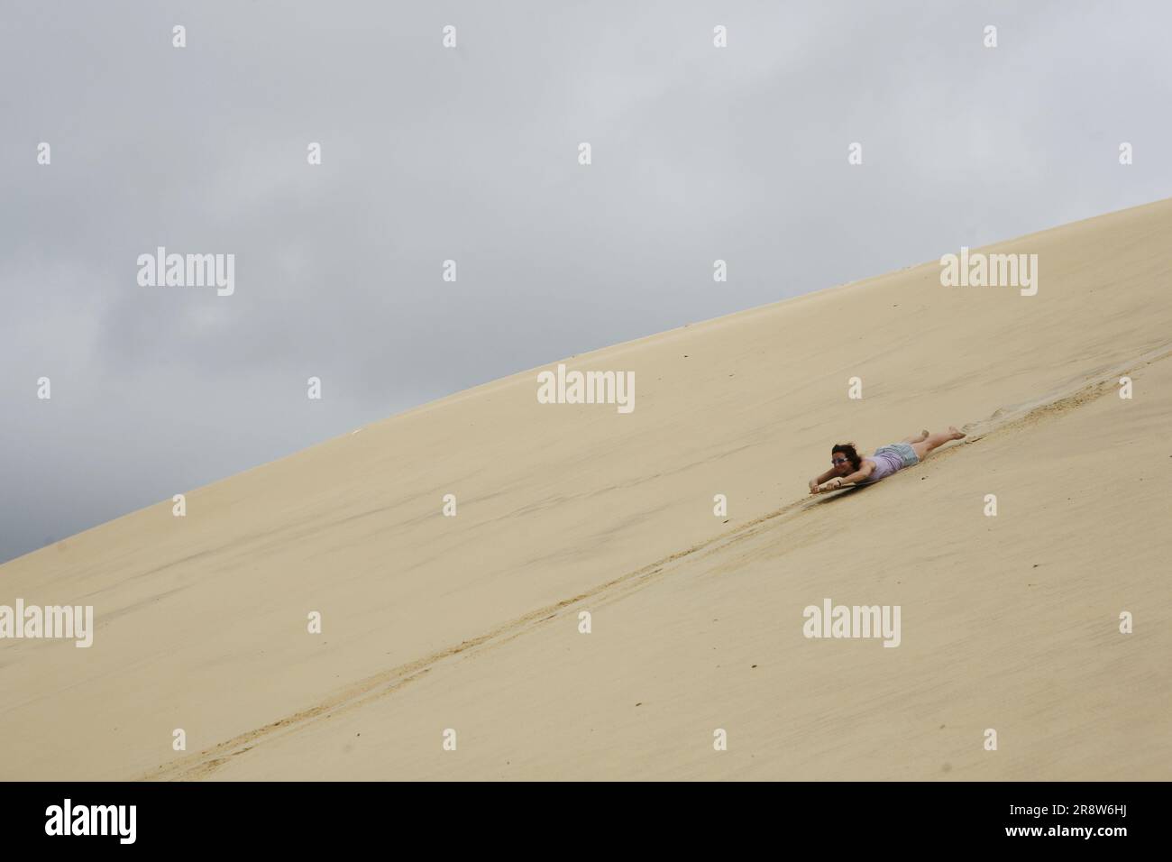 Sled on the Sand Beach Hill on the Sunshine Coast Stock Photo - Alamy