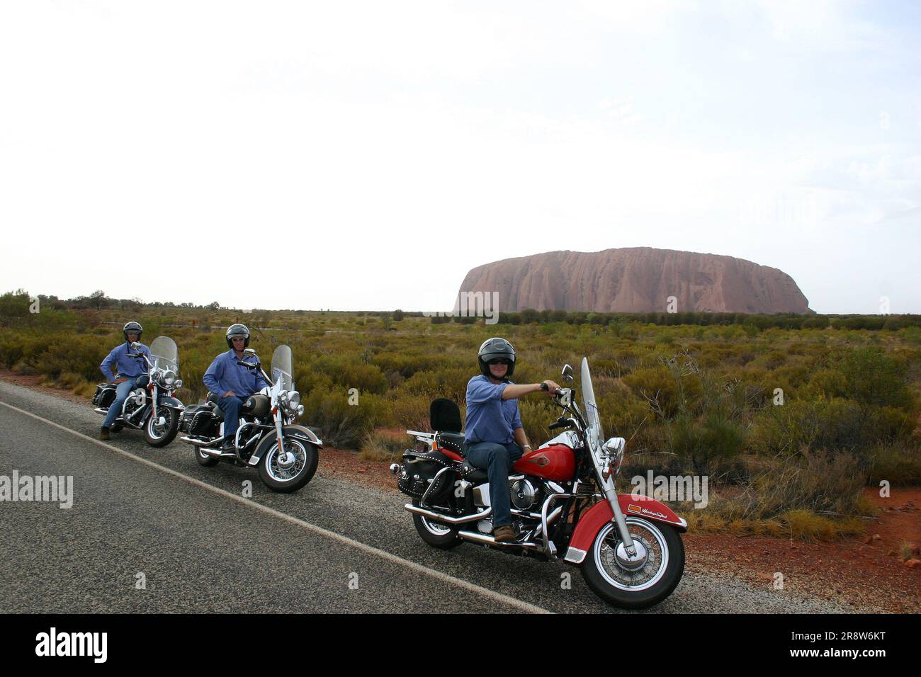 Motorcycle Travelers in Uluru Stock Photo - Alamy