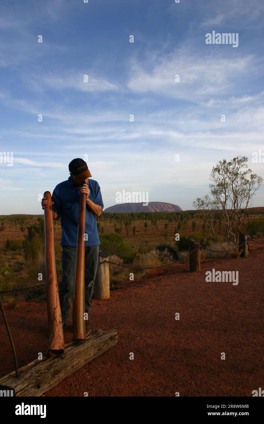 a native traditional instrument player in Uluru Stock Photo - Alamy