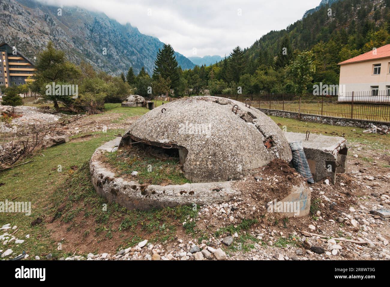 Communist era concrete bunkers still embedded in the ground in Valbona ...