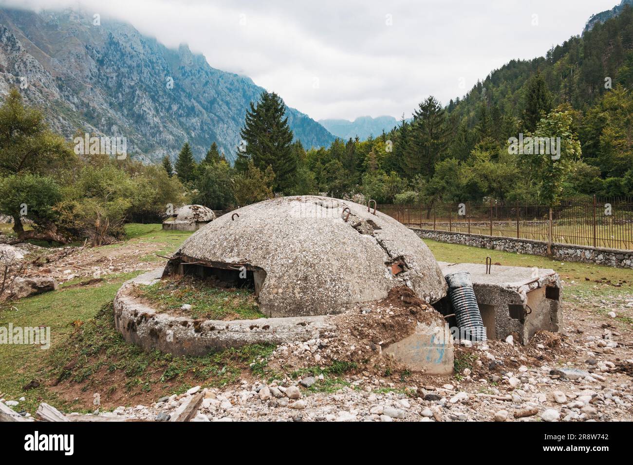 Communist era concrete bunkers still embedded in the ground in Valbona ...