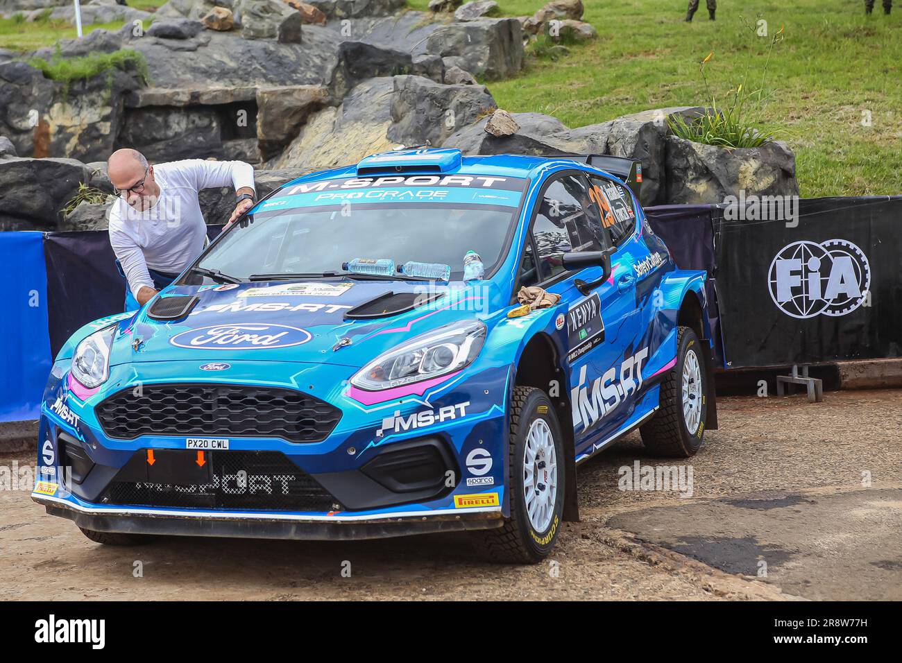 George Vassilakis a driver from Greece wipes his Ford Fiesta as he ...