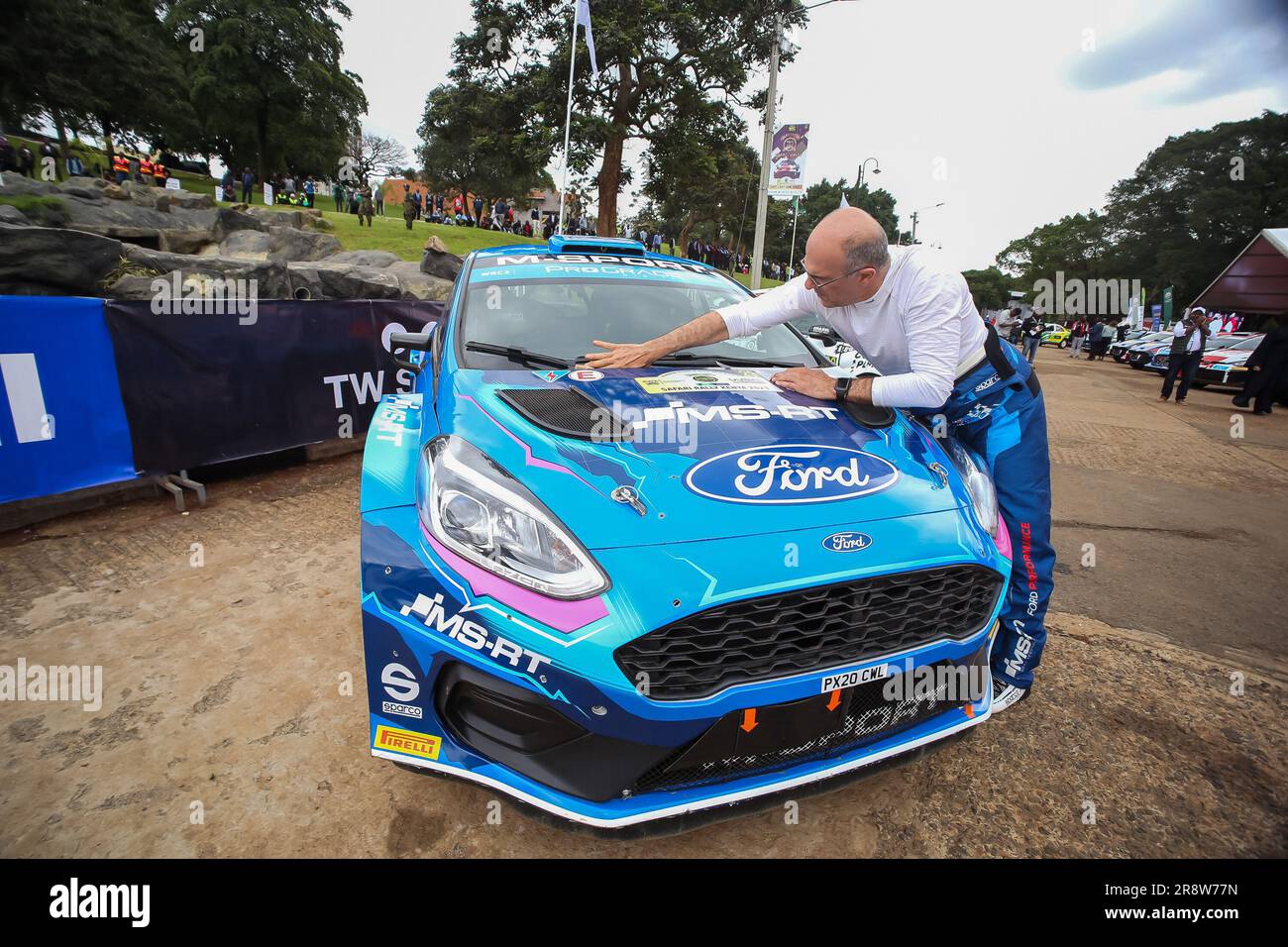 George Vassilakis a driver from Greece wipes his Ford Fiesta as he ...