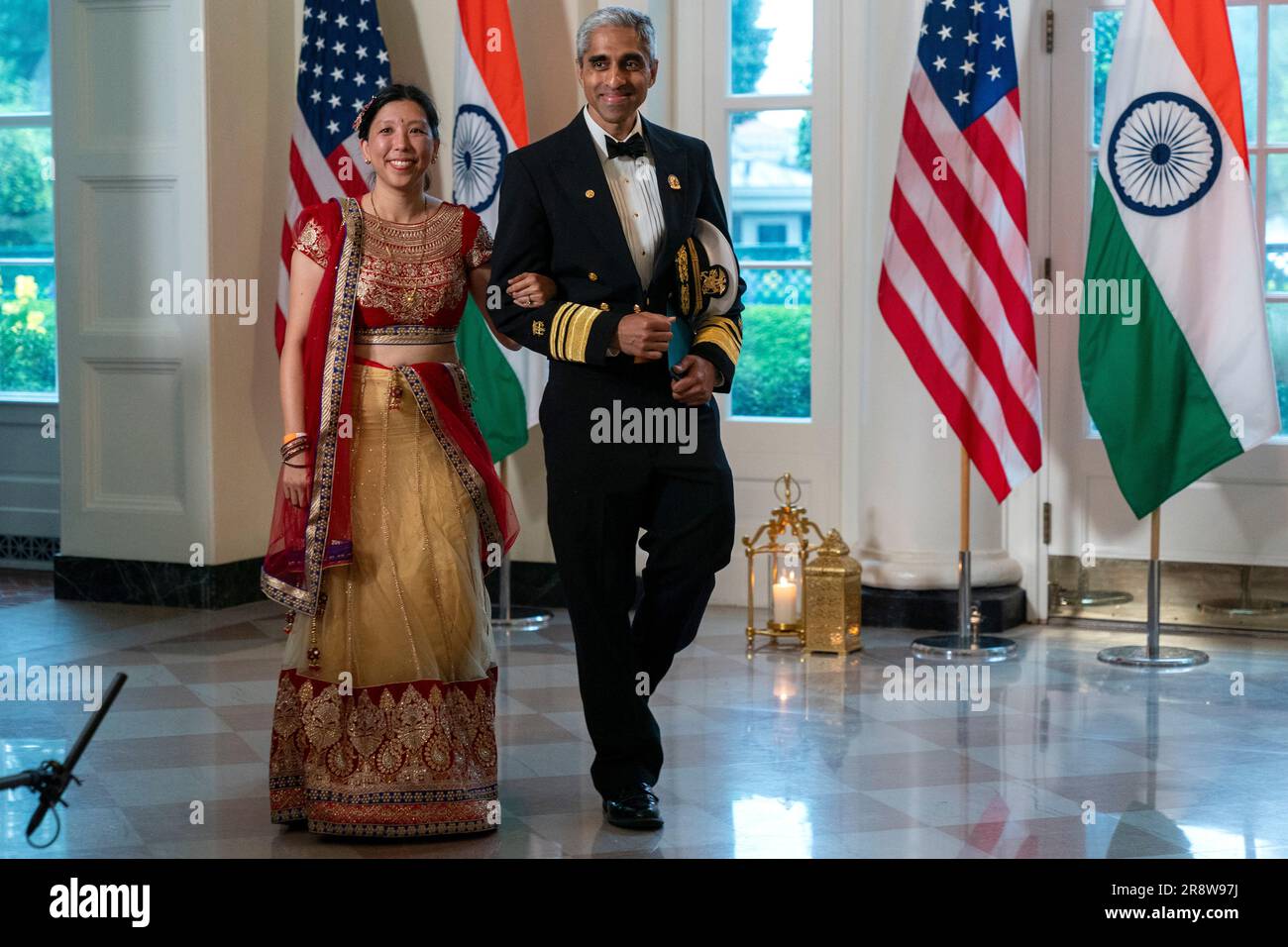 U.S. Surgeon General, Dr. Vivek Murthy, right, and his wife Alice Chen, arrive for the State ...