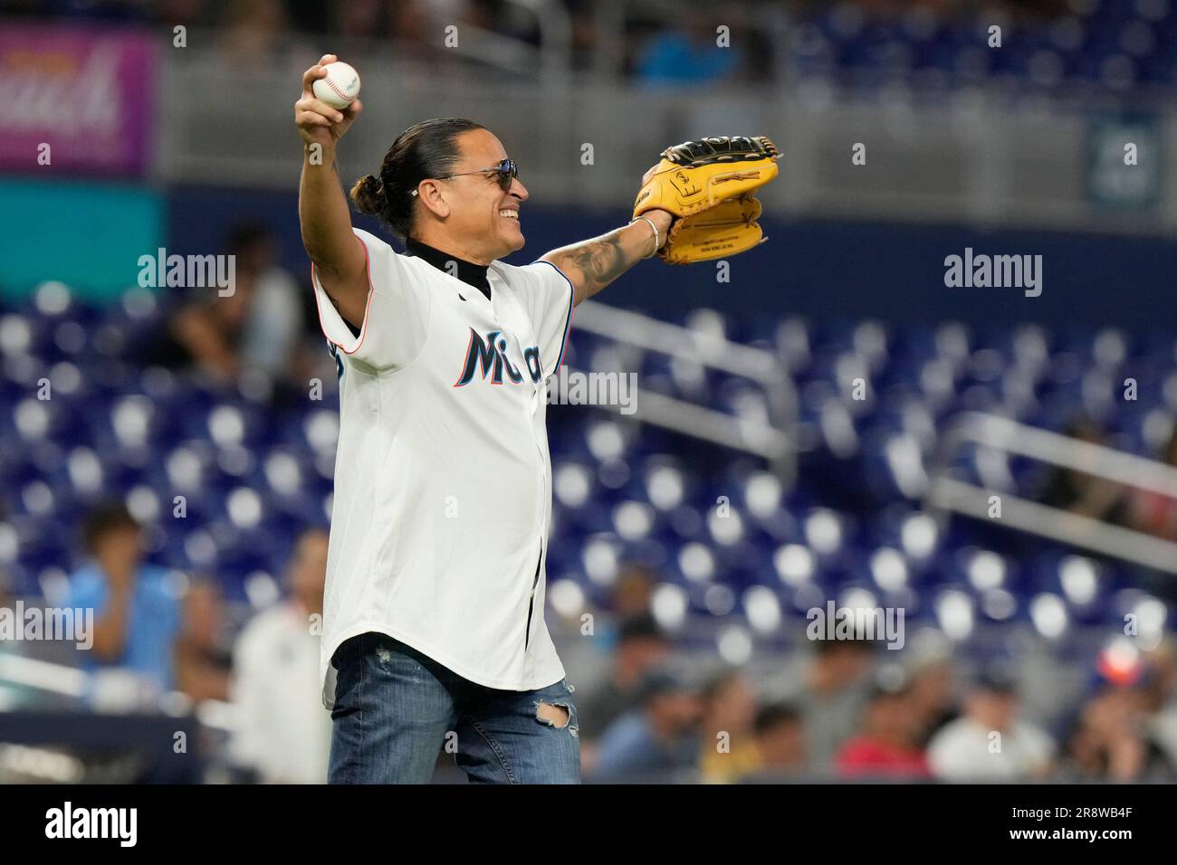 Puerto Rican singer Elvis Crespo prepares to throw out a ceremonial ...
