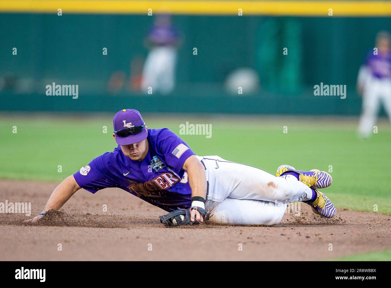 LSU second baseman Gavin Dugas fields a ball hit by Wake Forest during ...