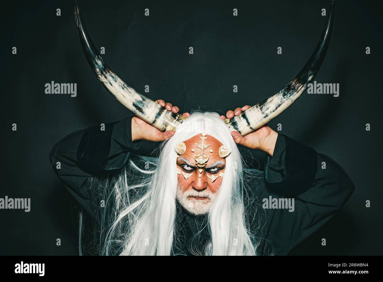 Magic and fairy tale concept. Man evil with horns. Monster with sharp ...